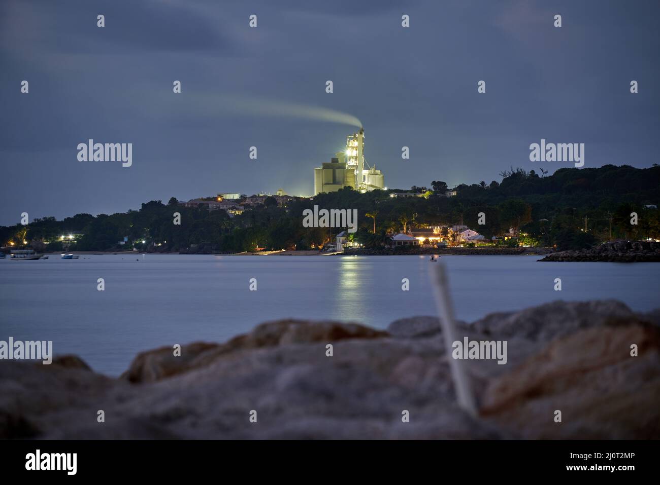 Scenery of a lighthouse on a shore at sunrise Stock Photo - Alamy