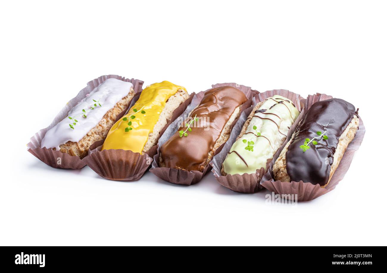 Set of decorated eclairs isolated on white Stock Photo - Alamy