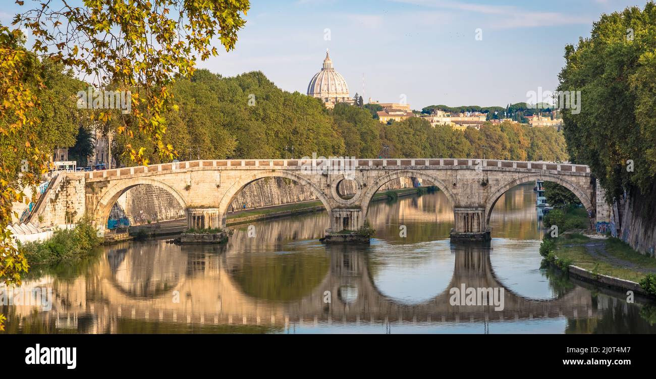 Bridge on Tiber river in Rome, Italy. Vatican Basilica cupola in ...