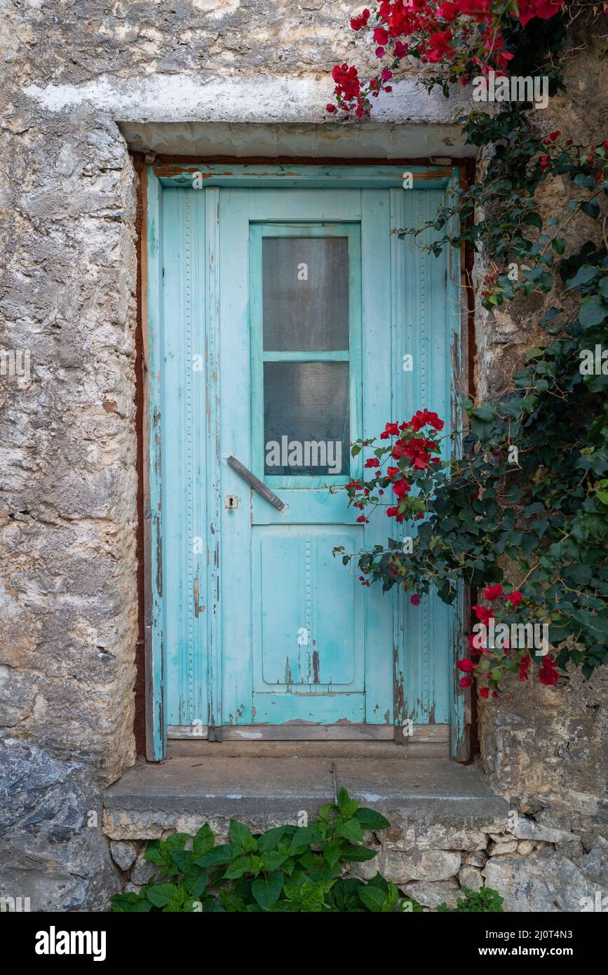 Old doors and windows in different towns on Crete, Greece Stock Photo ...