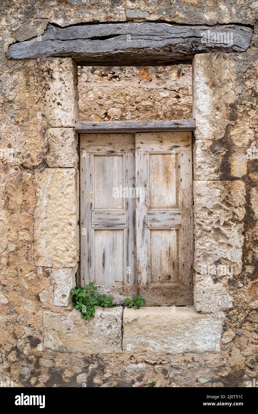 Old doors and windows in different towns on Crete, Greece Stock Photo ...