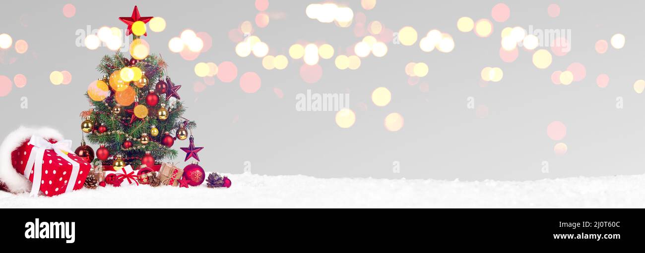 Christmas Tree with decoration on a winter background Stock Photo - Alamy