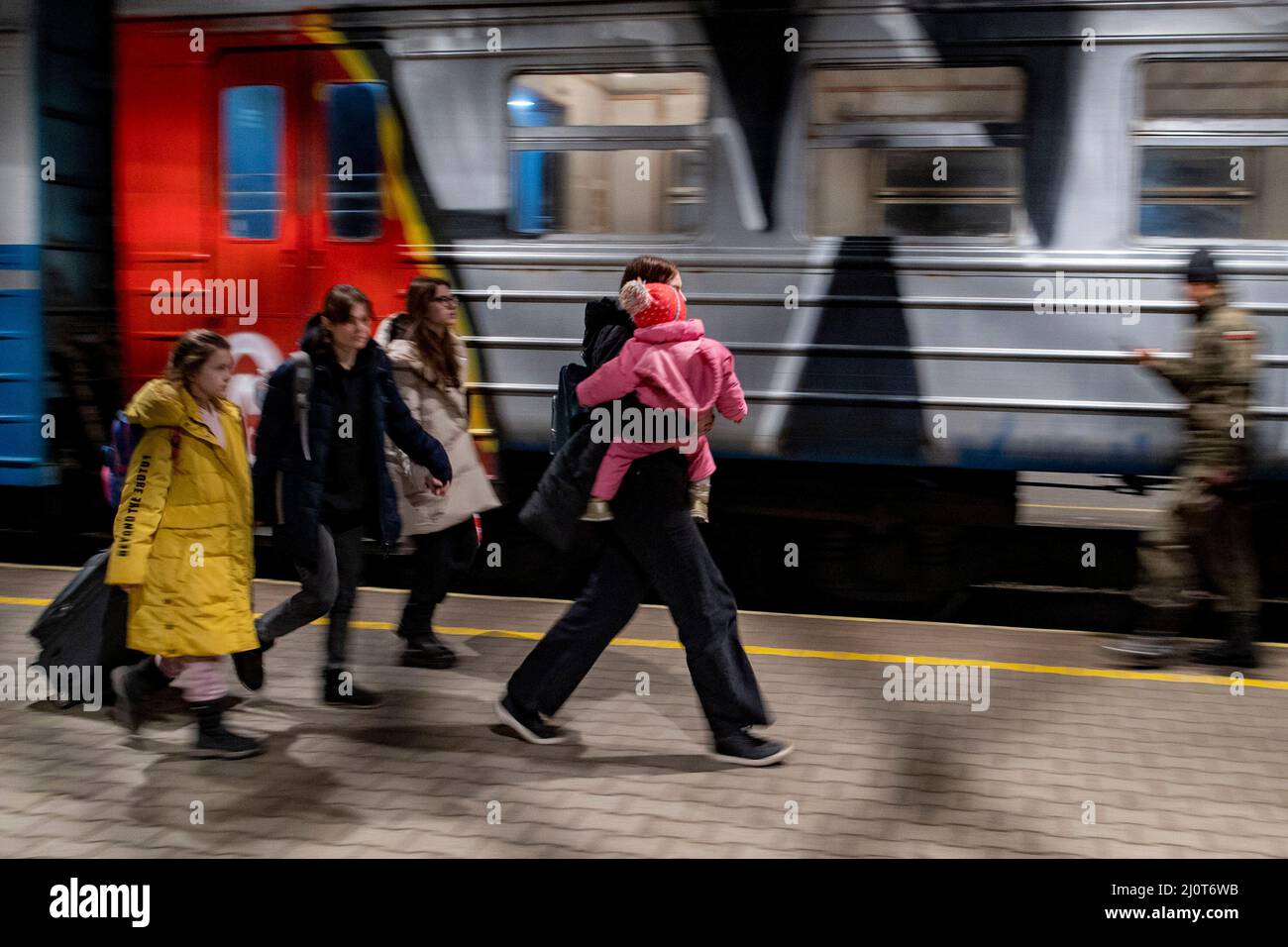 Refugees from ukraine arrive in poland by train hi-res stock ...