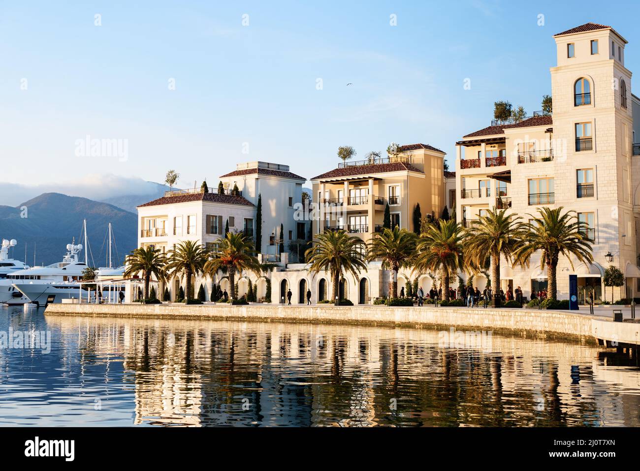 Modern expensive buildings on the coast of the bay. Porto. Montenegro ...