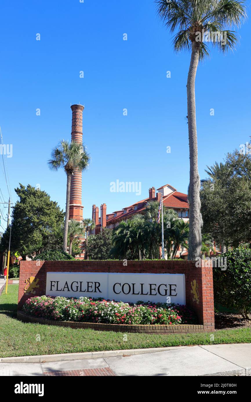The sign of Flagler College with the college campus in the background ...