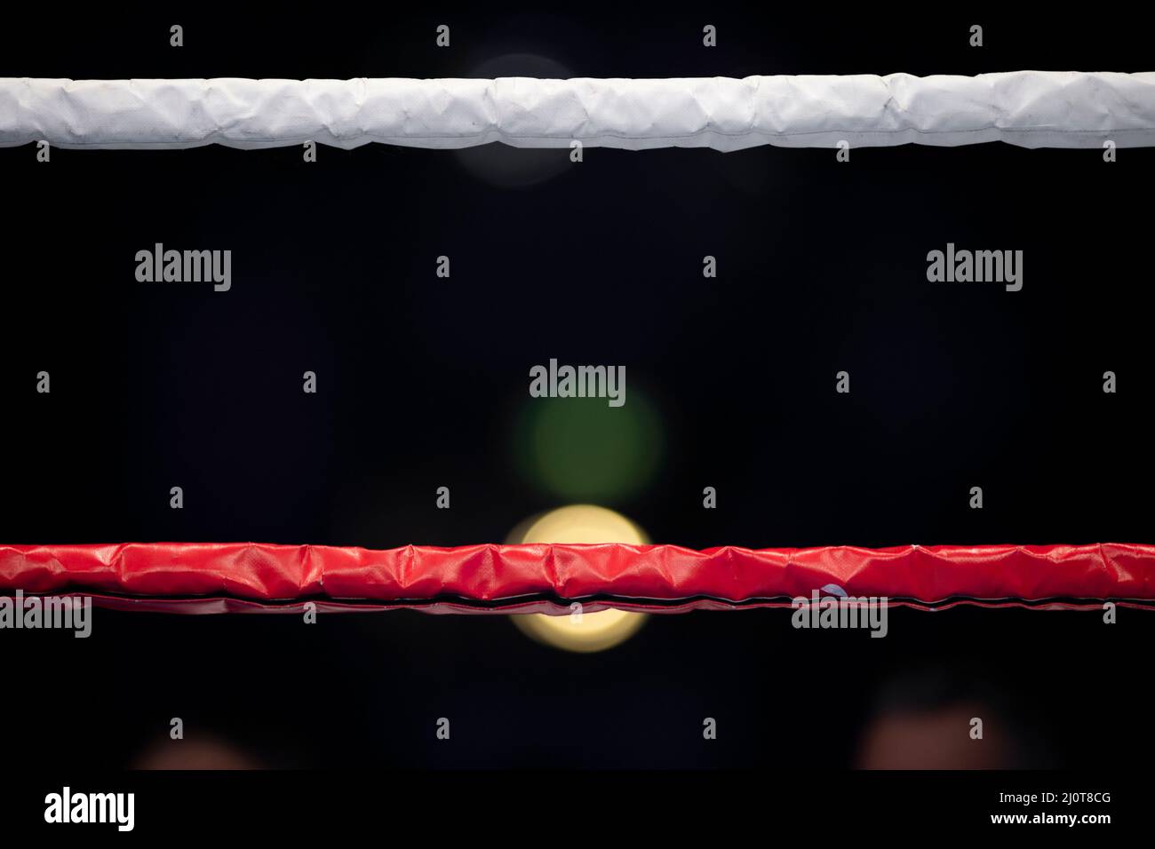 Boxing ring ropes with a blur spotlight. Horizontal sport theme poster ...