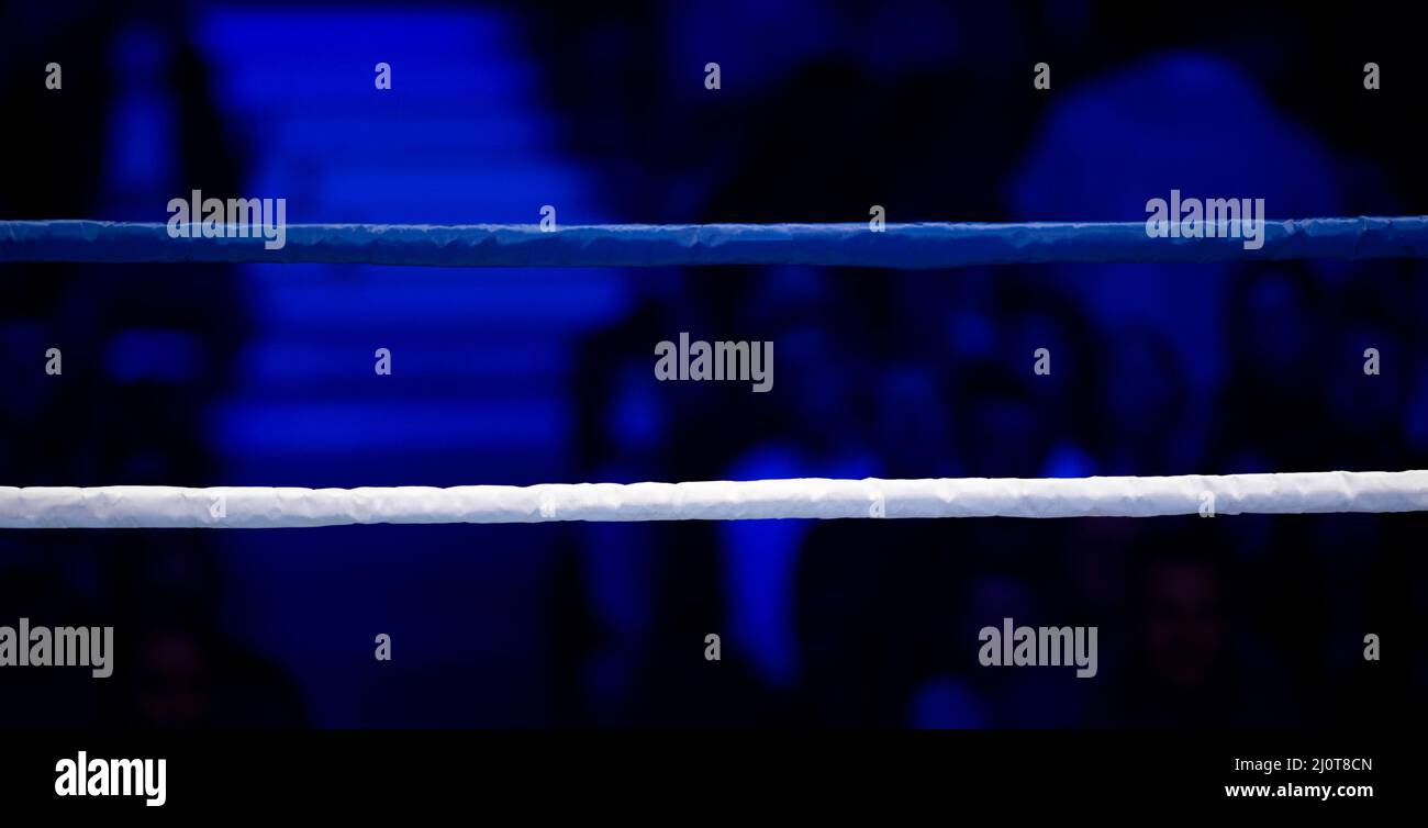 Boxing ring ropes with a blur spotlight. Horizontal sport theme poster ...