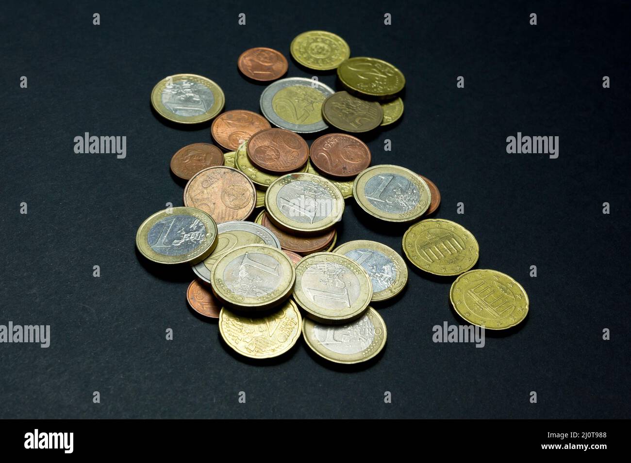 Euros on a table Stock Photo - Alamy