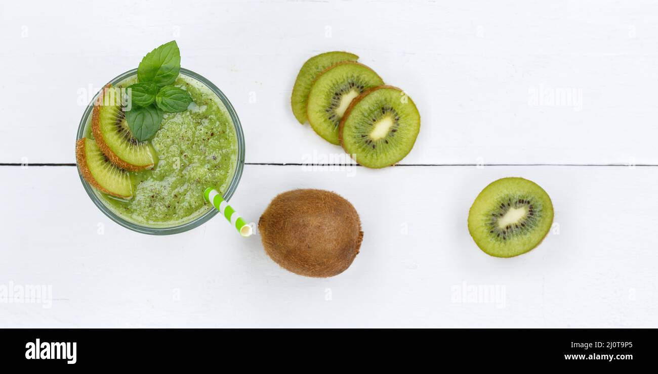 Green smoothie fruit juice drink juice kiwi in glass from above ...