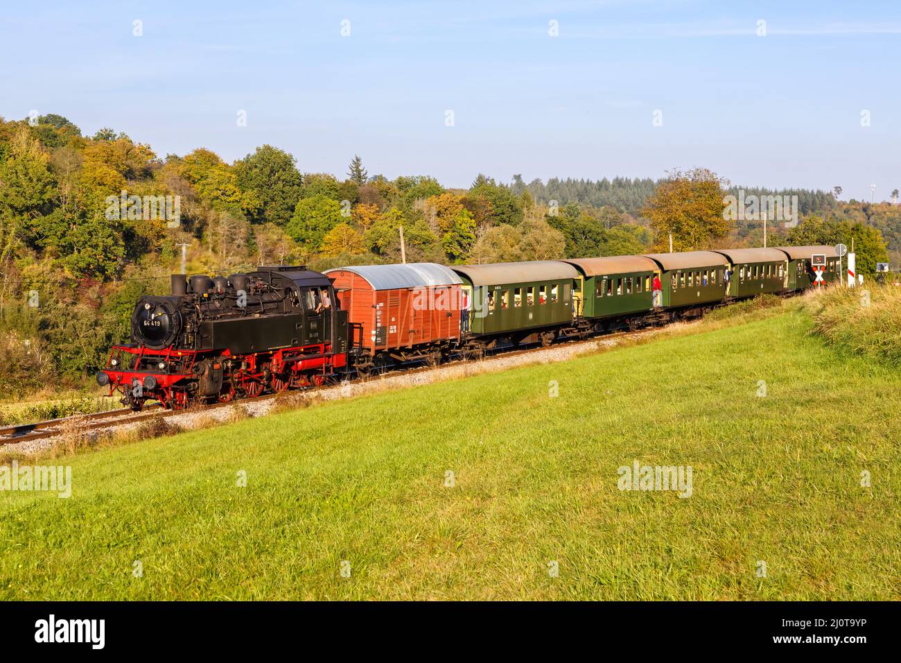 Steam railroad steam train steam locomotive on the StrohgÃ¤ubahn in ...