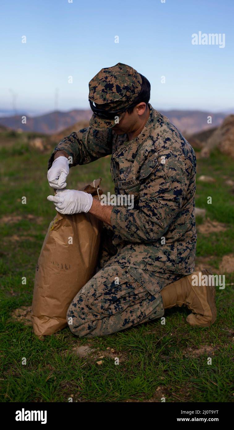 U.S. Marine Sgt. Travis Knigge, an explosive ordnance technician with ...