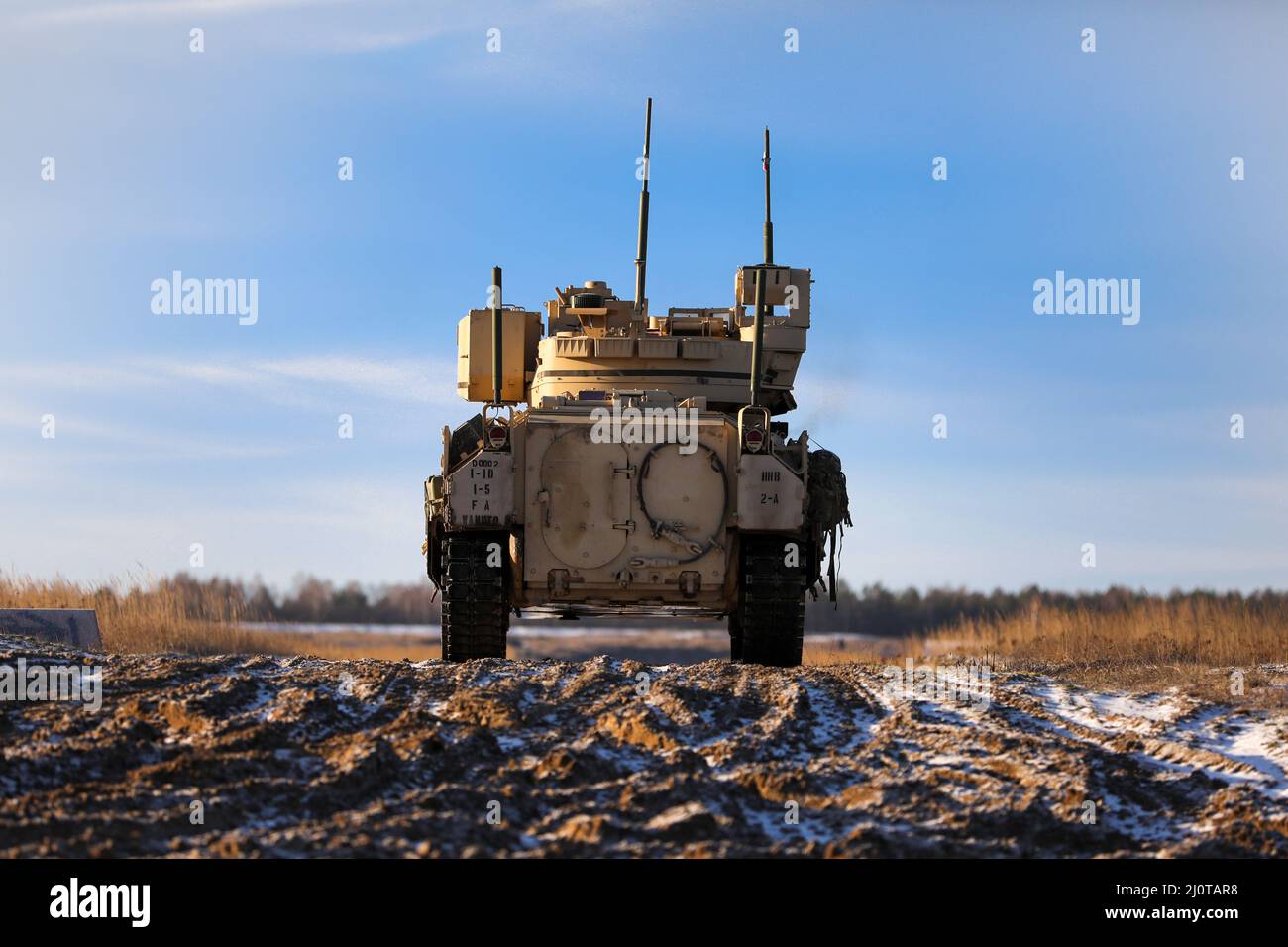 An M2A3 Bradley Fighting Vehicle (BFV) crew assigned to Charlie Company ...