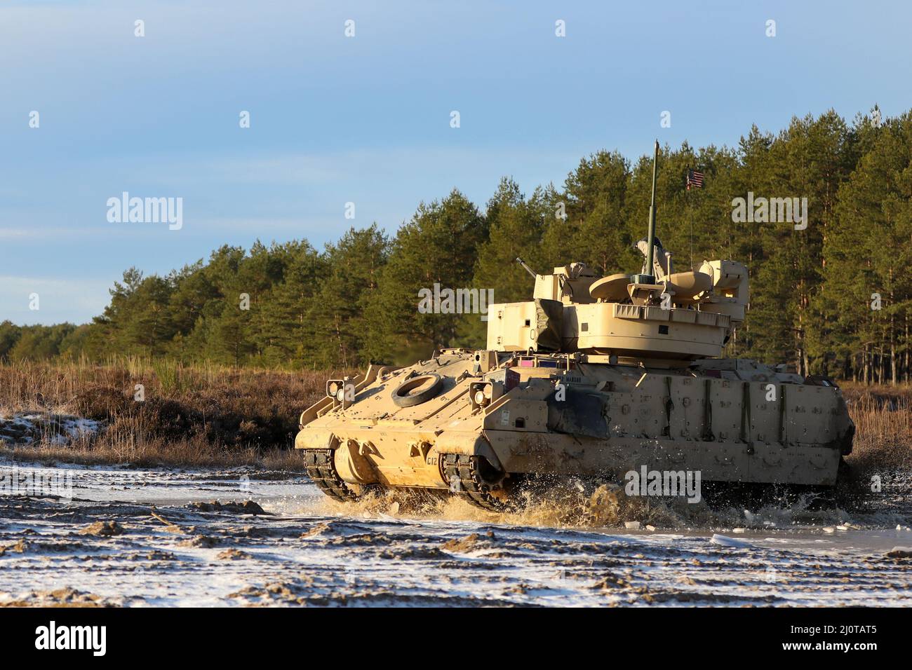An M2A3 Bradley Fighting Vehicle (BFV) crew assigned to Charlie Company ...