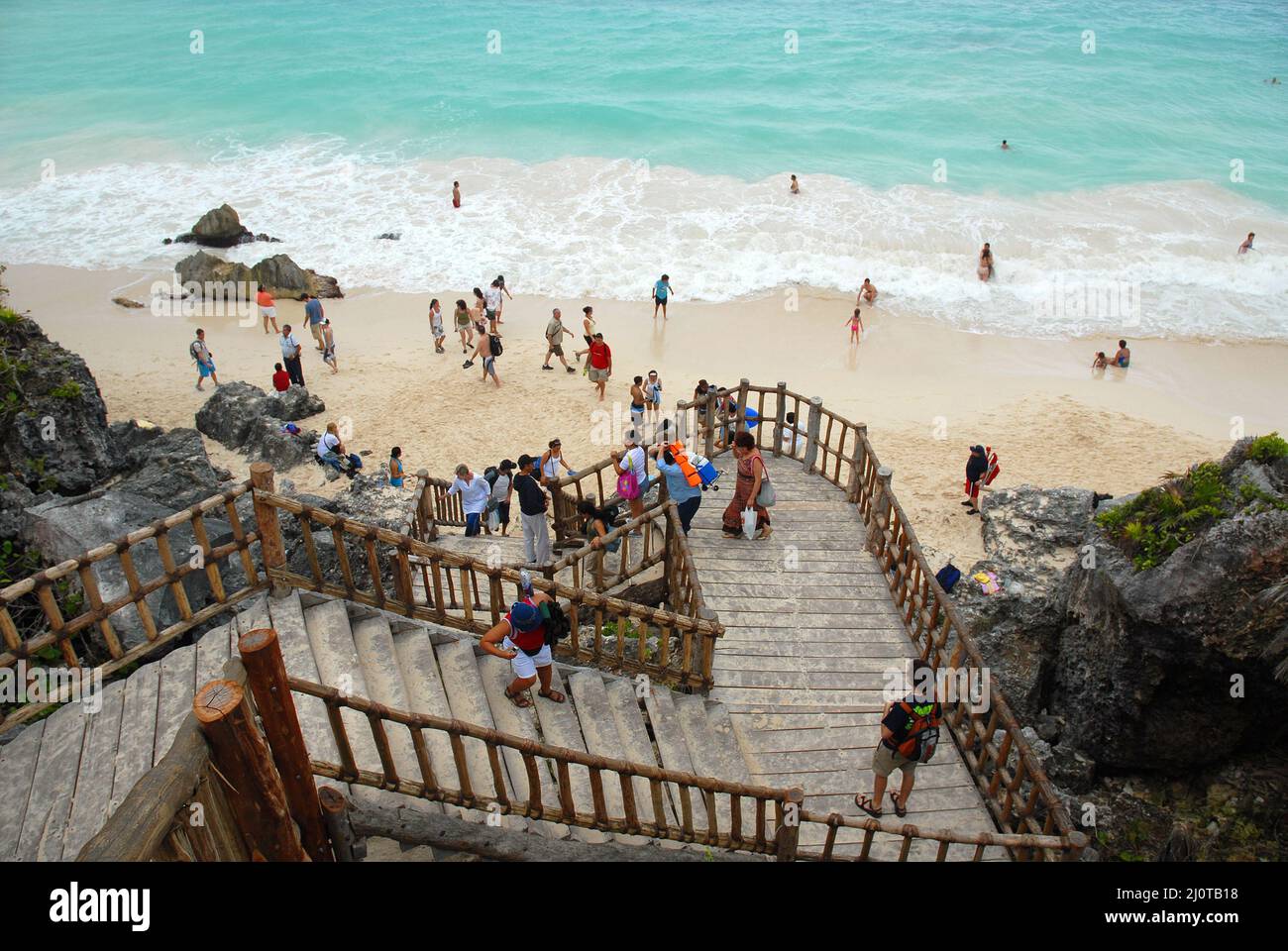 Stairs decend to the beach from the ancient ruins of Tulum In southern ...