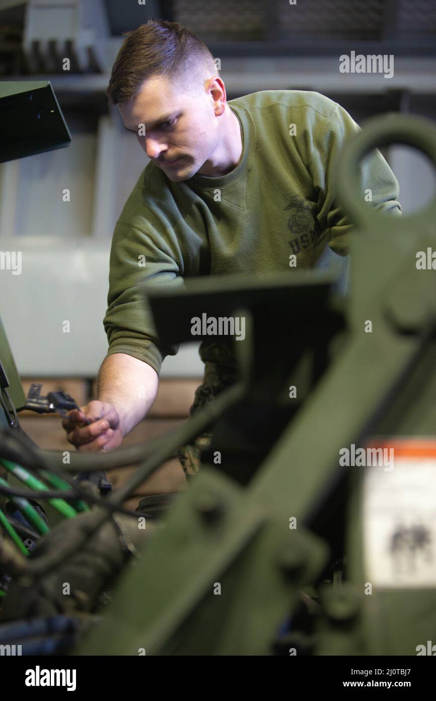 U.S. Marine Corps Cpl. Samuel Reppert, a motor transport mechanic ...