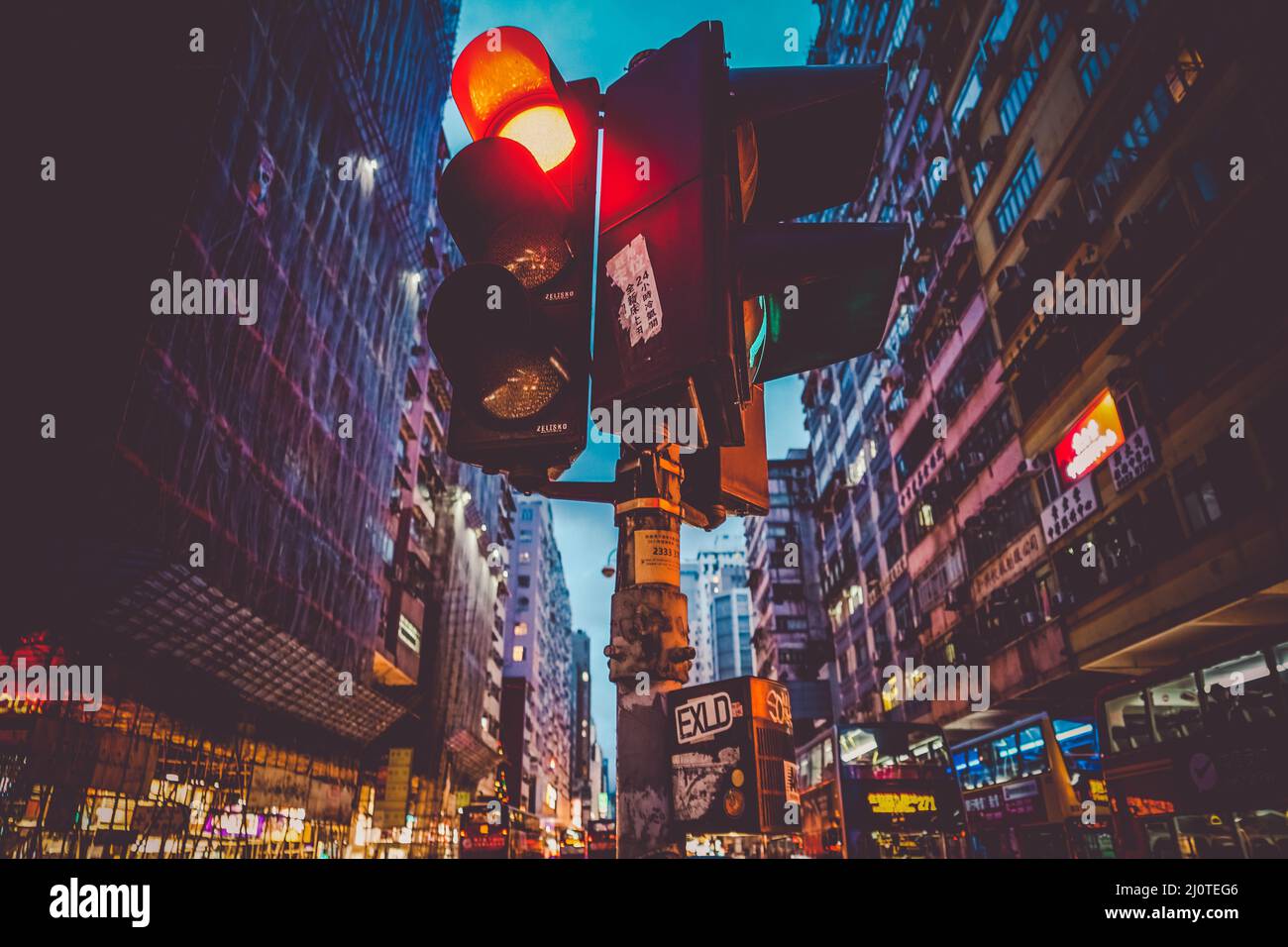 Hong Kong traffic lights and high-rise buildings Stock Photo - Alamy