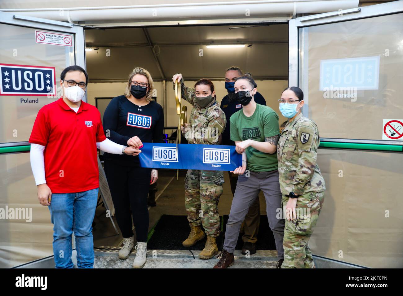 At the center, Maj. Lara Morell of the 191st Regional Support Group ...