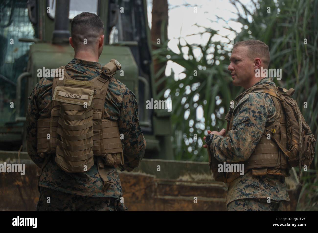 U.S. Marine Corps Maj. Corydon Cusack, (left), operations officer for ...