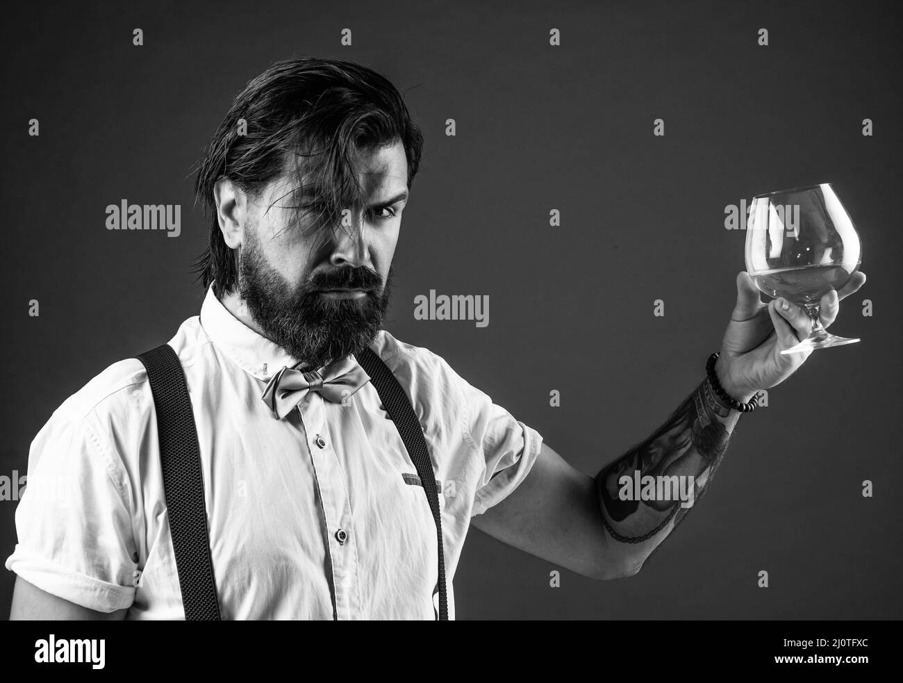 try this. whiskey and scotch. old fashioned bearded barman. retro man ...