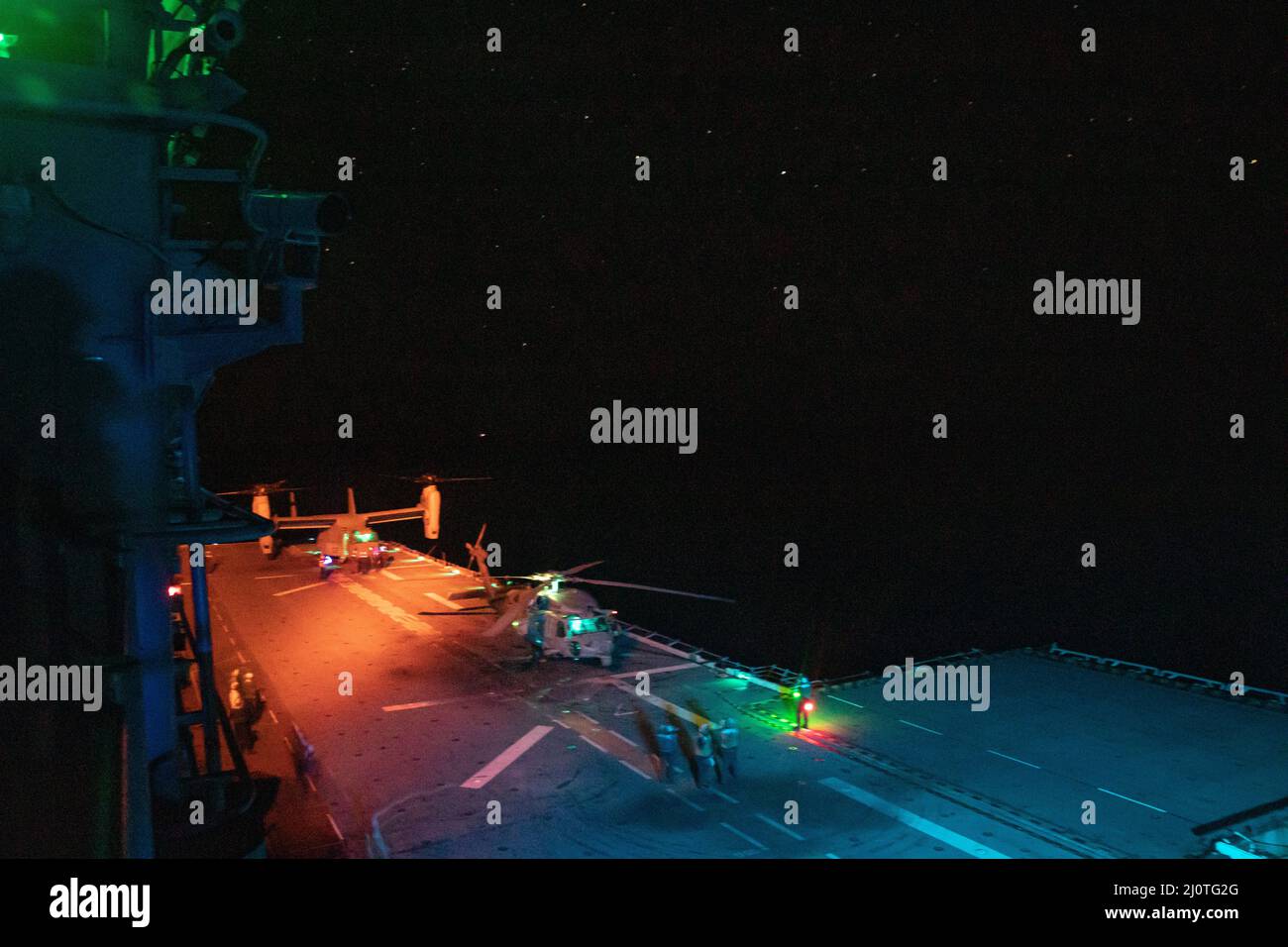 A U.S. Marine Corps MV-22 Osprey and a U.S. Navy MH-60S conduct pre ...