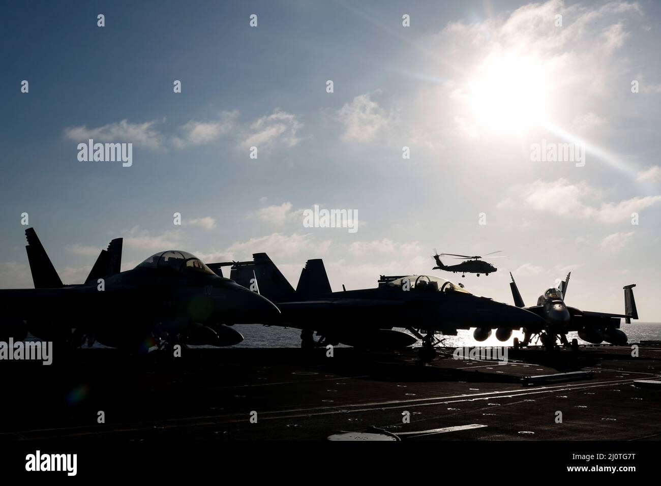 SOUTH CHINA SEA (Jan. 25, 2022) An MH-60R Sea Hawk helicopter, assigned ...