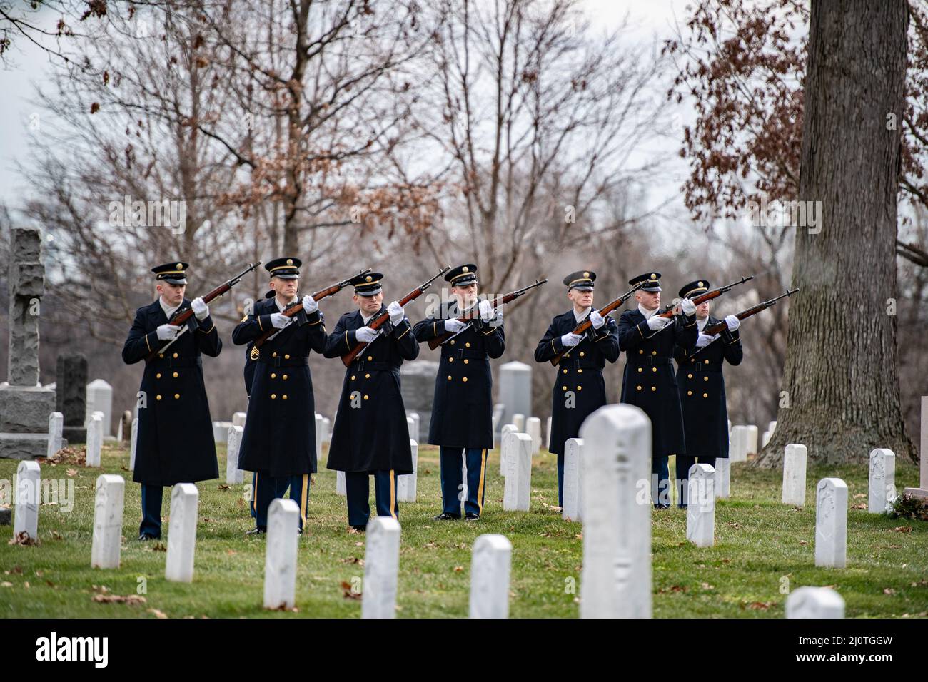 A firing party from the 3d U.S. Infantry Regiment (The Old Guard) fires ...
