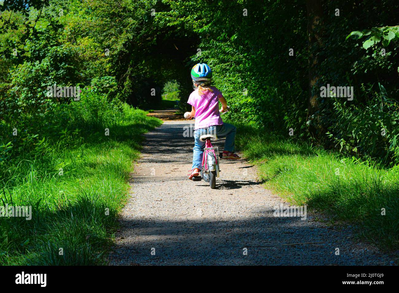 Boy with cycle hi-res stock photography and images - Alamy