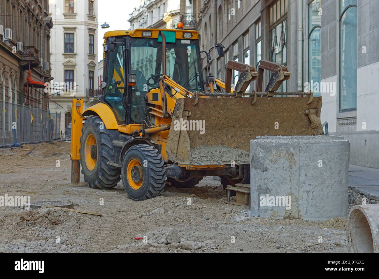 Backhoe digger loader machine at construction site city sewer Stock ...