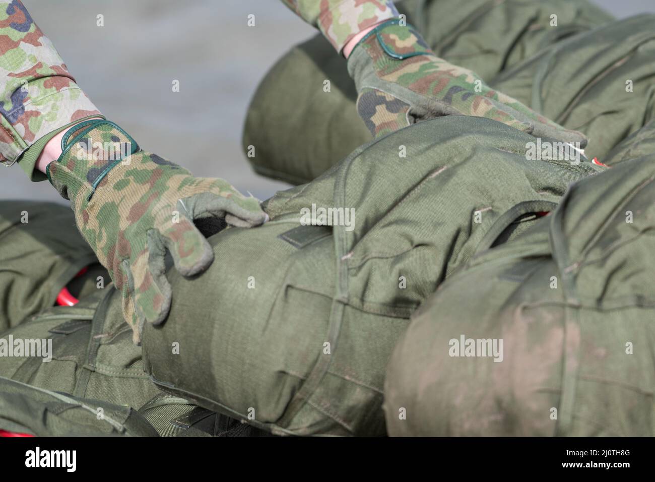 A Japan Ground Self-Defense Force paratrooper assigned to the 1st ...