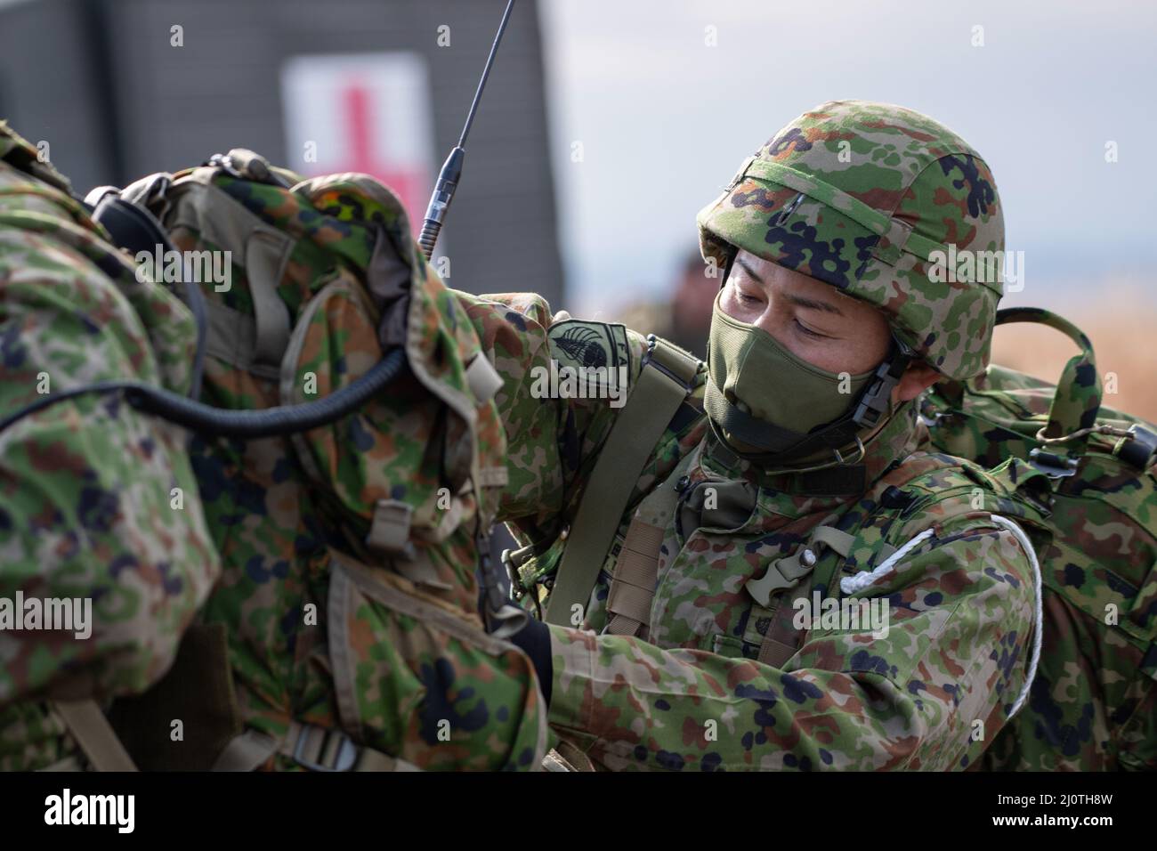 A Japan Ground Self-Defense Force paratrooper assigned to the 1st ...