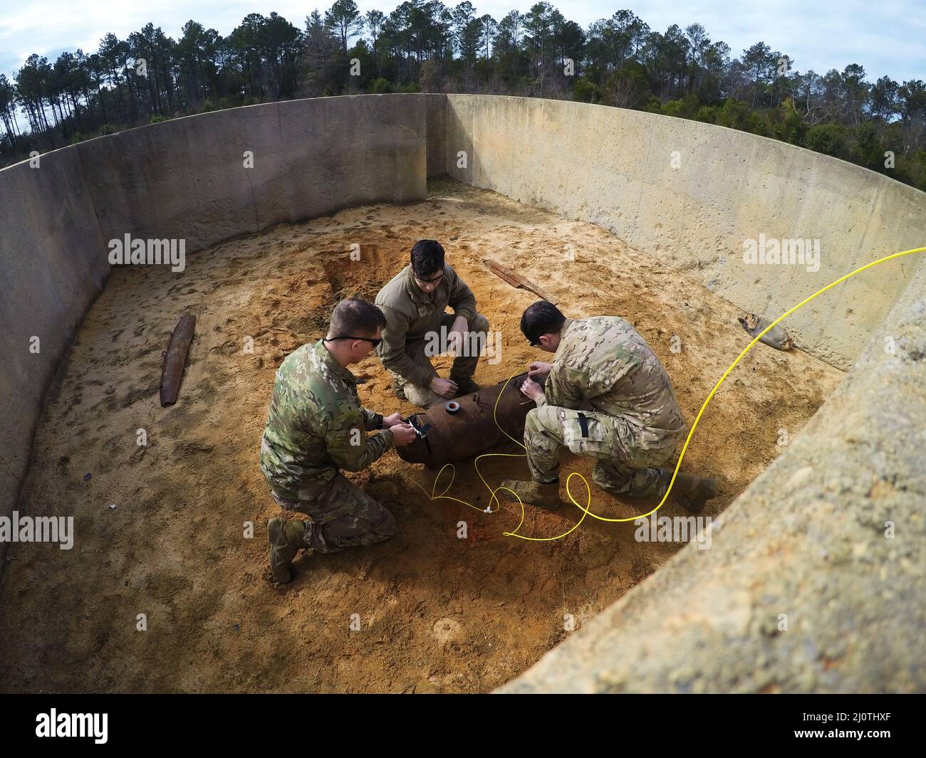 U.S. Airmen assigned to the 20th Civil Engineer Squadron explosive ...