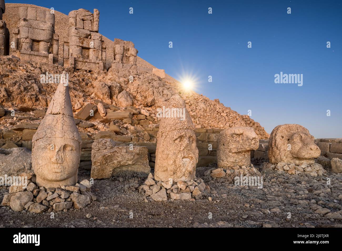 Antique statues on Nemrut mountain at sunrise, Turkey Stock Photo - Alamy