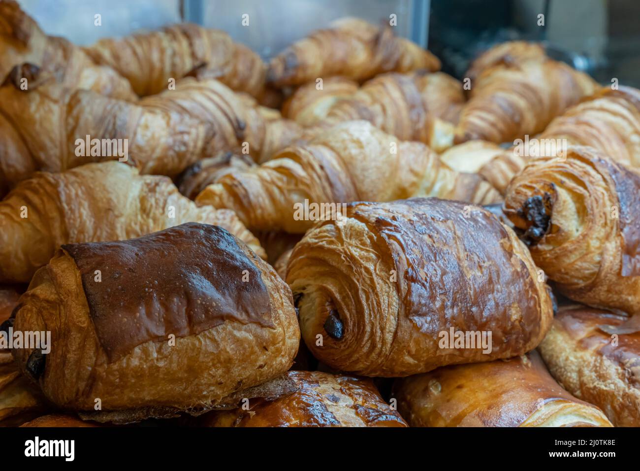 Artisan baker and pastry chef. Detail of mixed pastries in a bakery ...