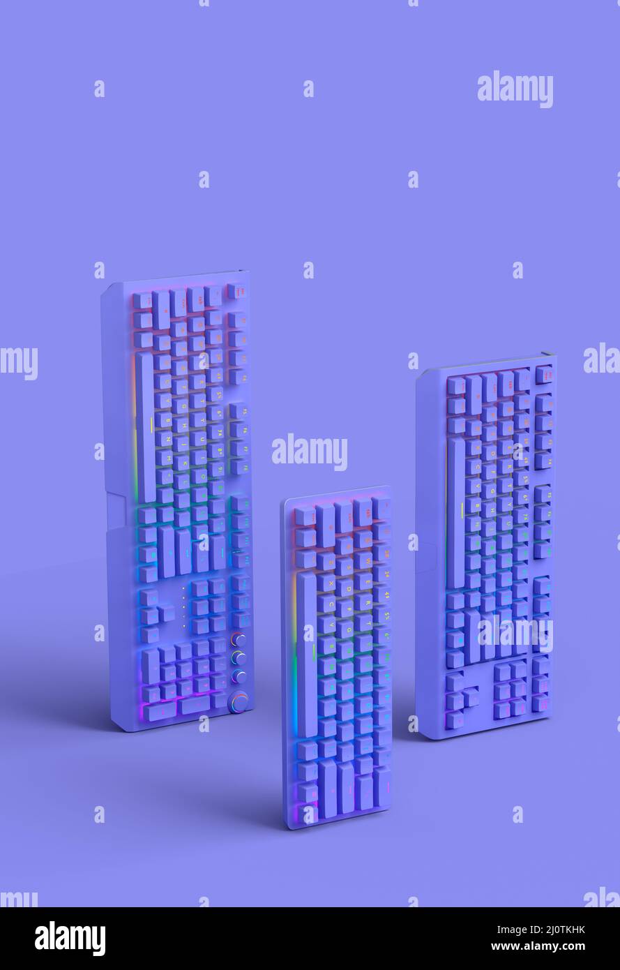 Top view of gamer workspace and gear like keyboards on purple ...