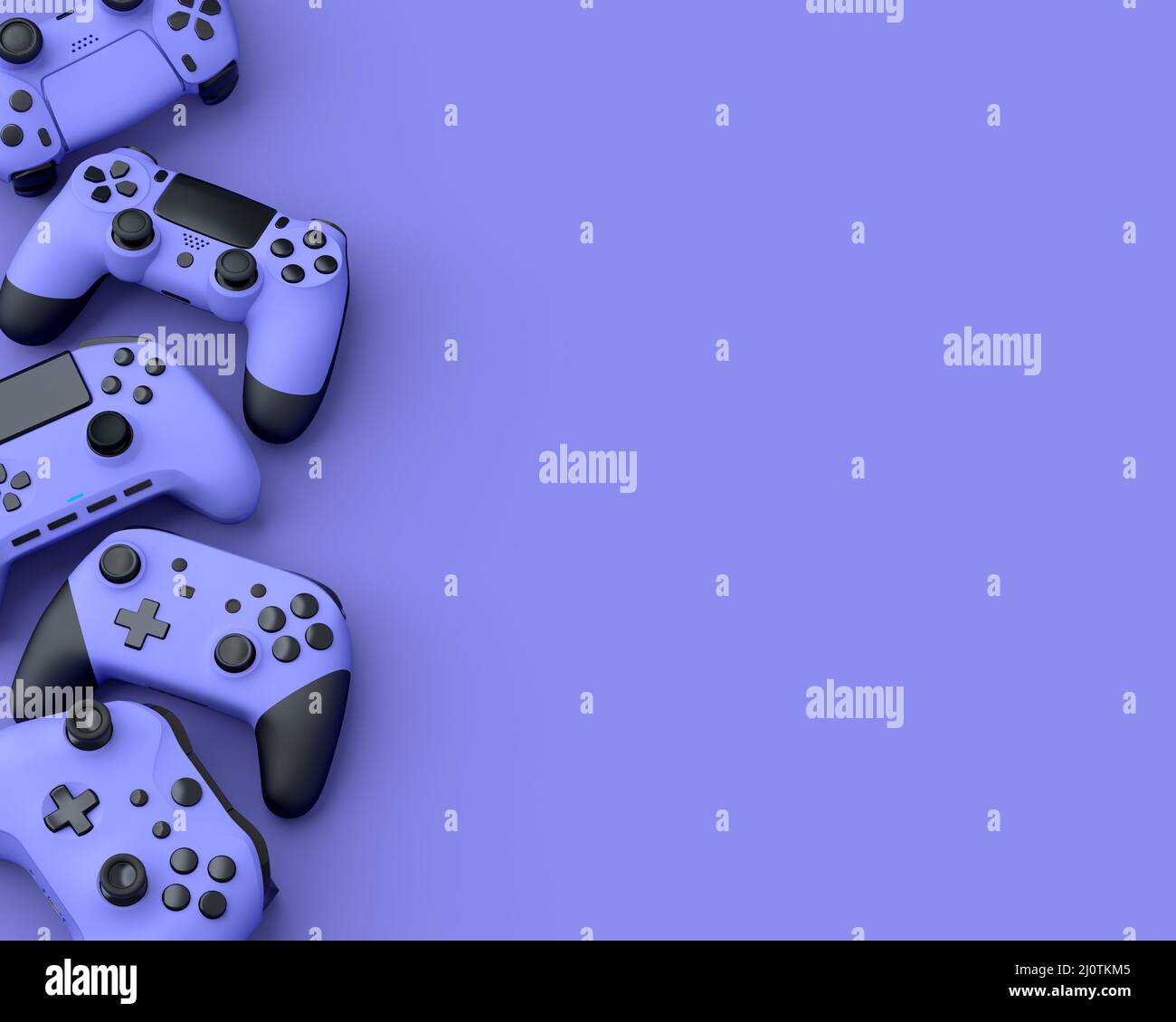 Set of lying gamer joysticks or gamepads on purple background with blur ...
