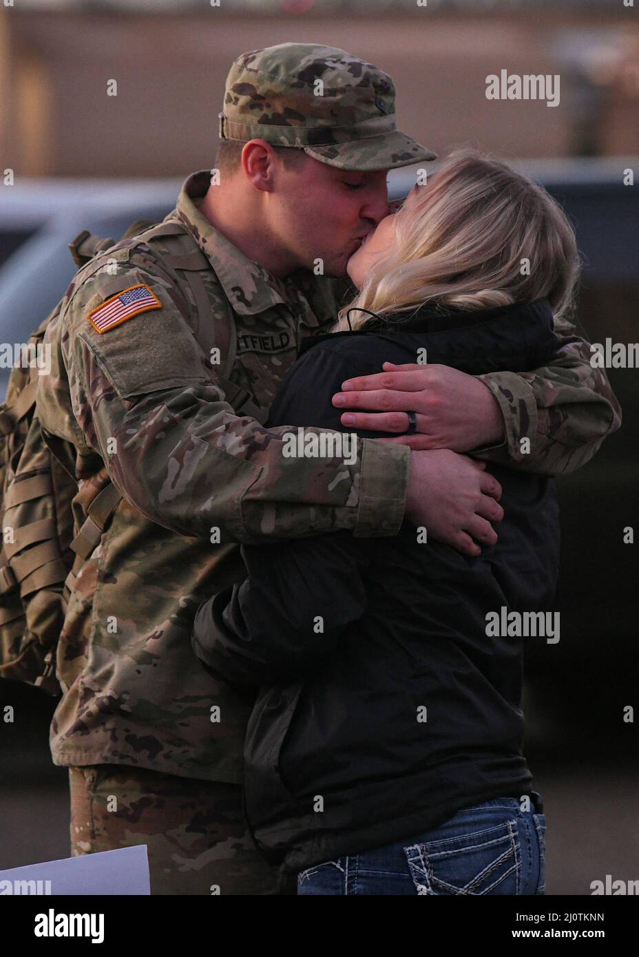 Family members embrace and greet Oregon Army National Guard Soldiers returning from deployment ...