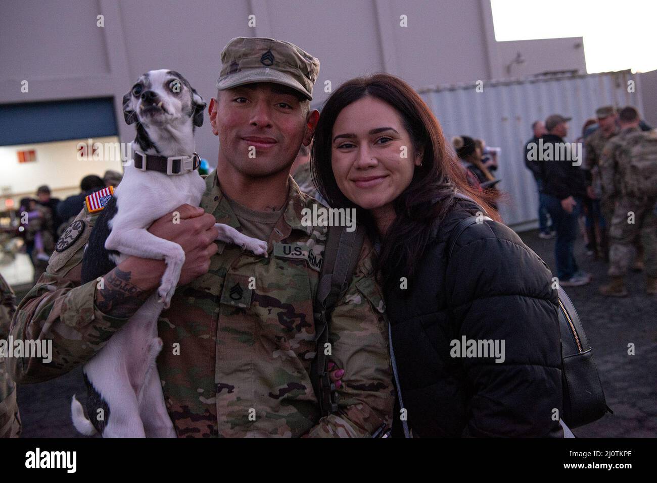 Family members embrace and greet Oregon Army National Guard Soldiers ...