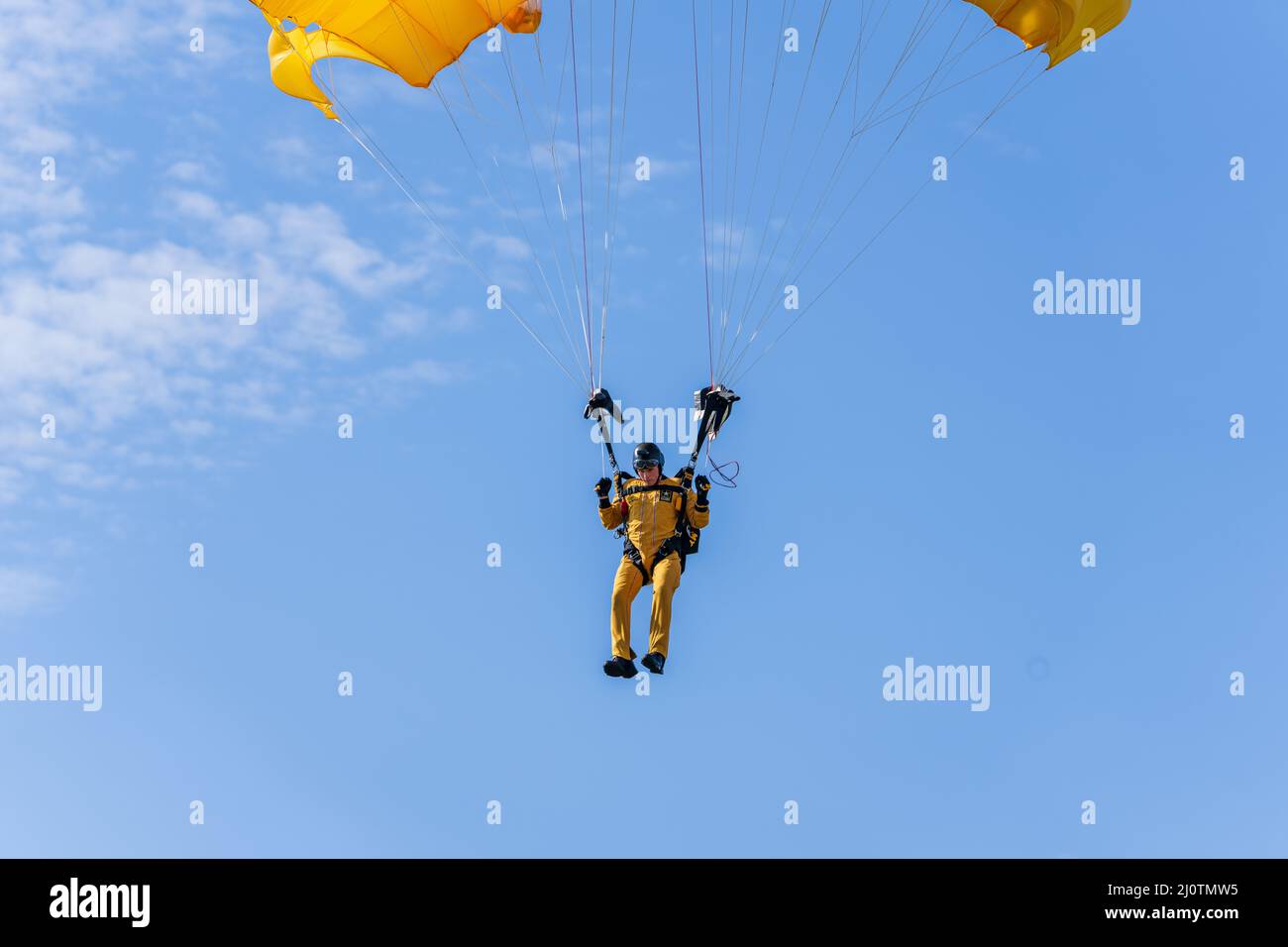 Sgt. Daniel McKeon of the U.S. Army Parachute Team lands his parachute ...