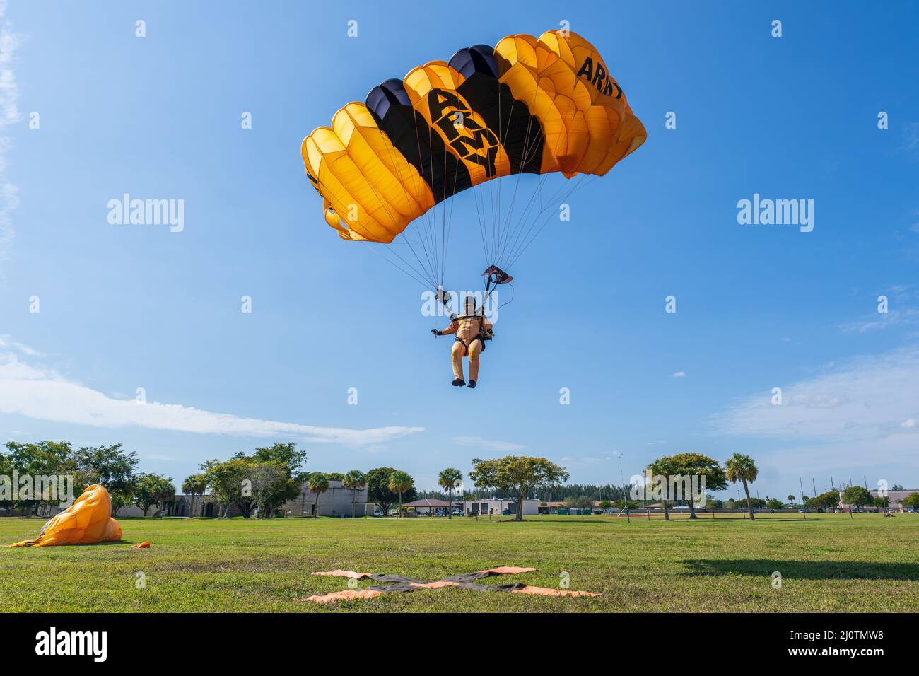 Sgt. 1st Class Dominic Perry of the U.S. Army Parachute Team lands his ...