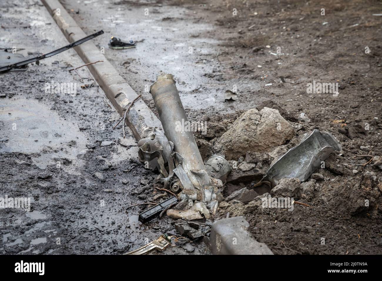 The remains of a Grad rocket stuck in the curb. Eastern suburbs of ...
