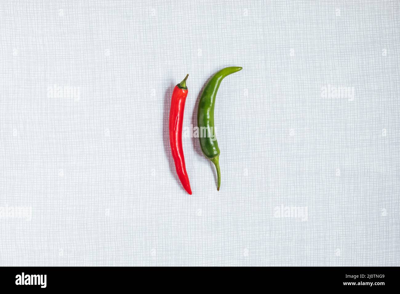 Selection of raw chili peppers. Group of red and green peppers. Hot and ...