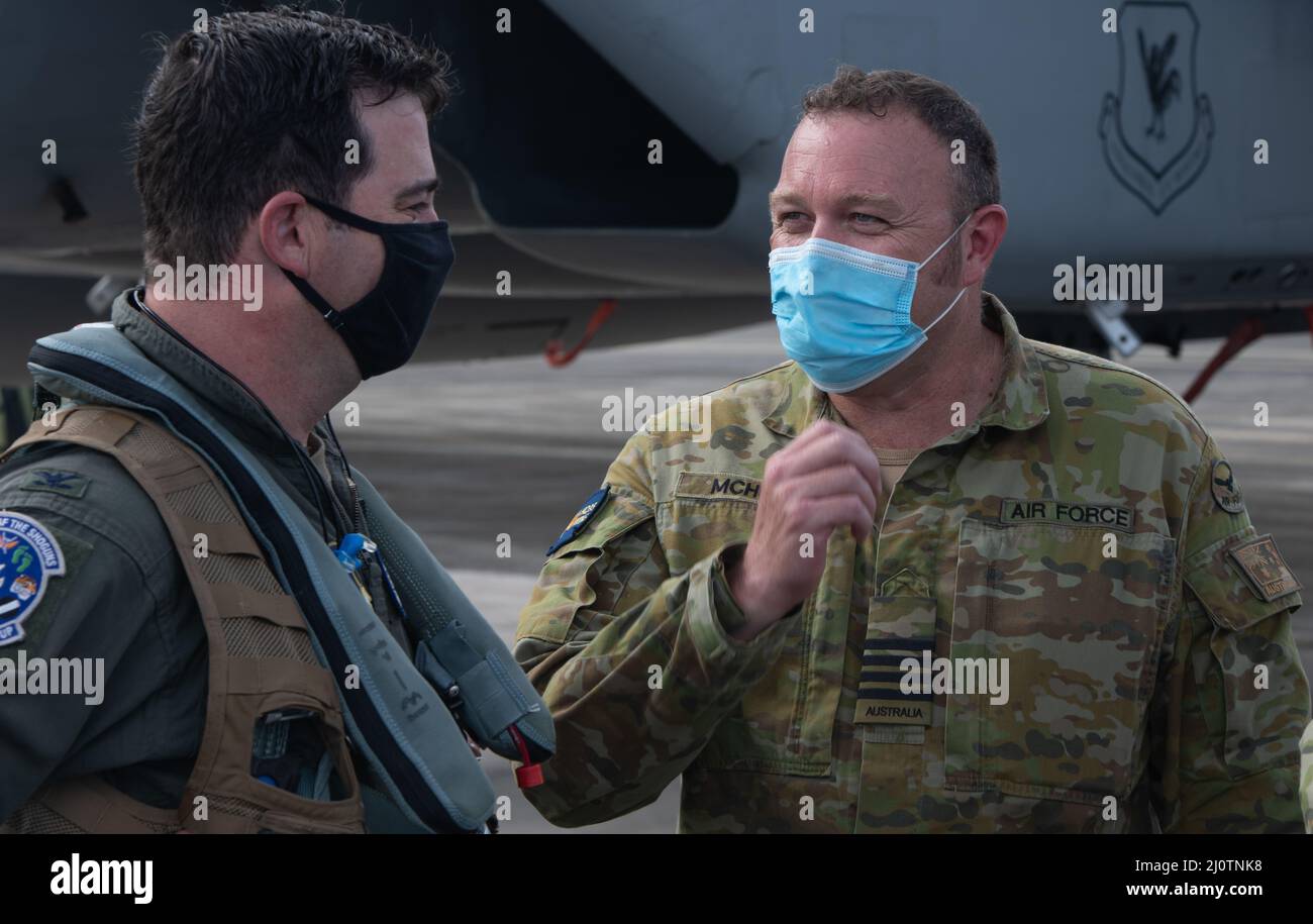 U.S. Air Force Col. Taylor Ferrell, left, 18th Operations Group ...