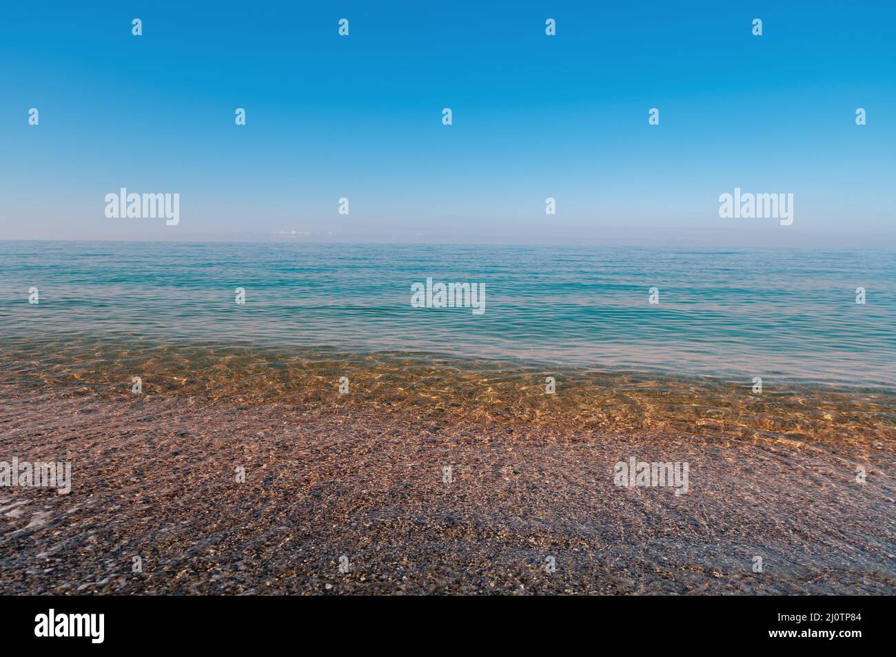 Morning calm sea. Marine background haze over the sea surface during ...