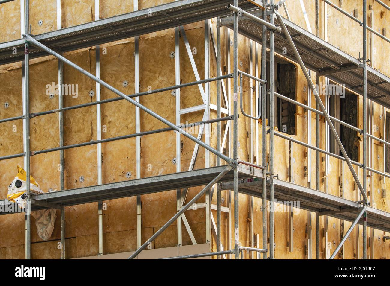 Outside wall heat isolation with mineral wool Stock Photo - Alamy