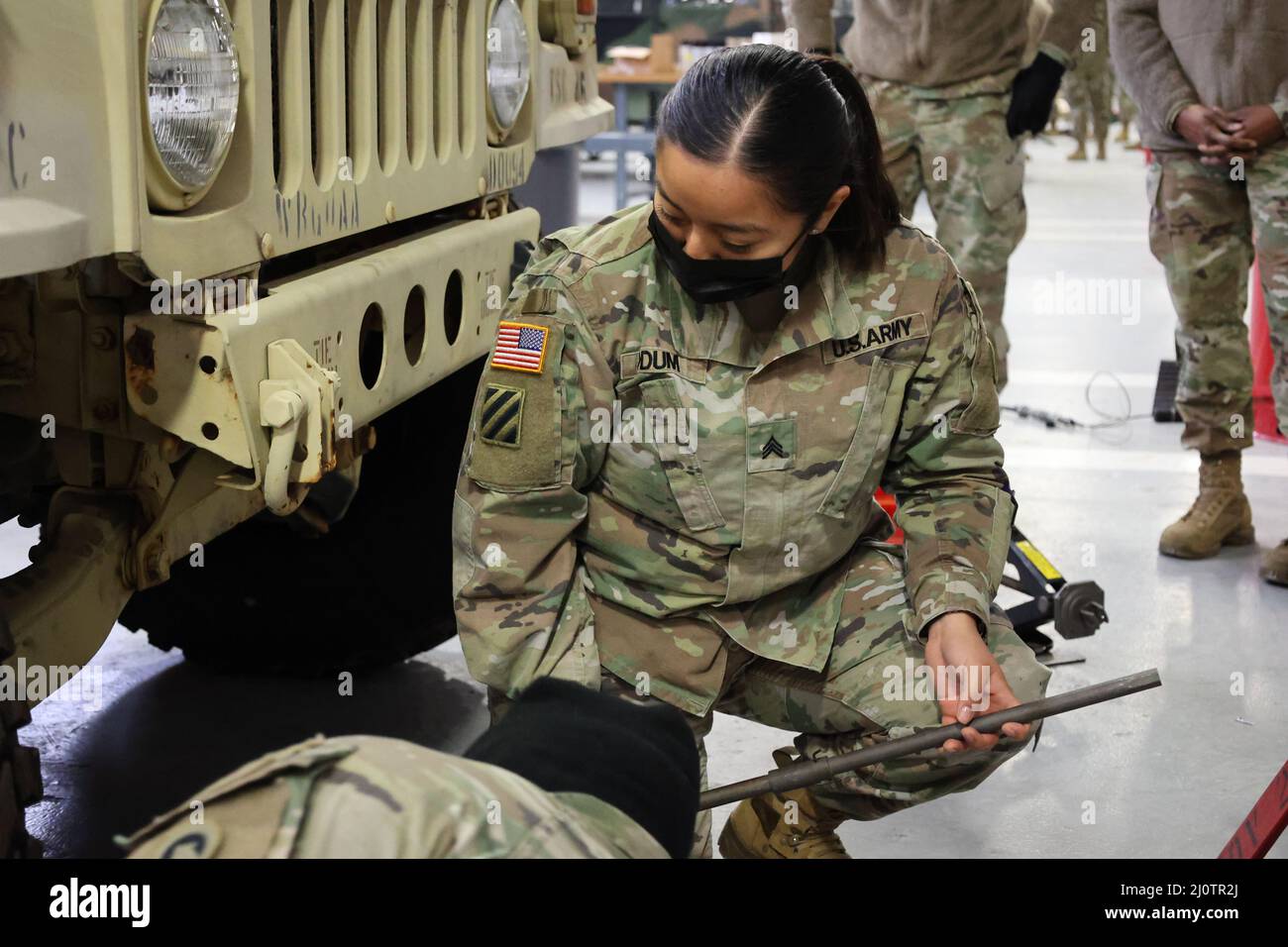 Sgt. Jossy Odum, supply sergeant, 1st Theater Sustainment Command, uses ...