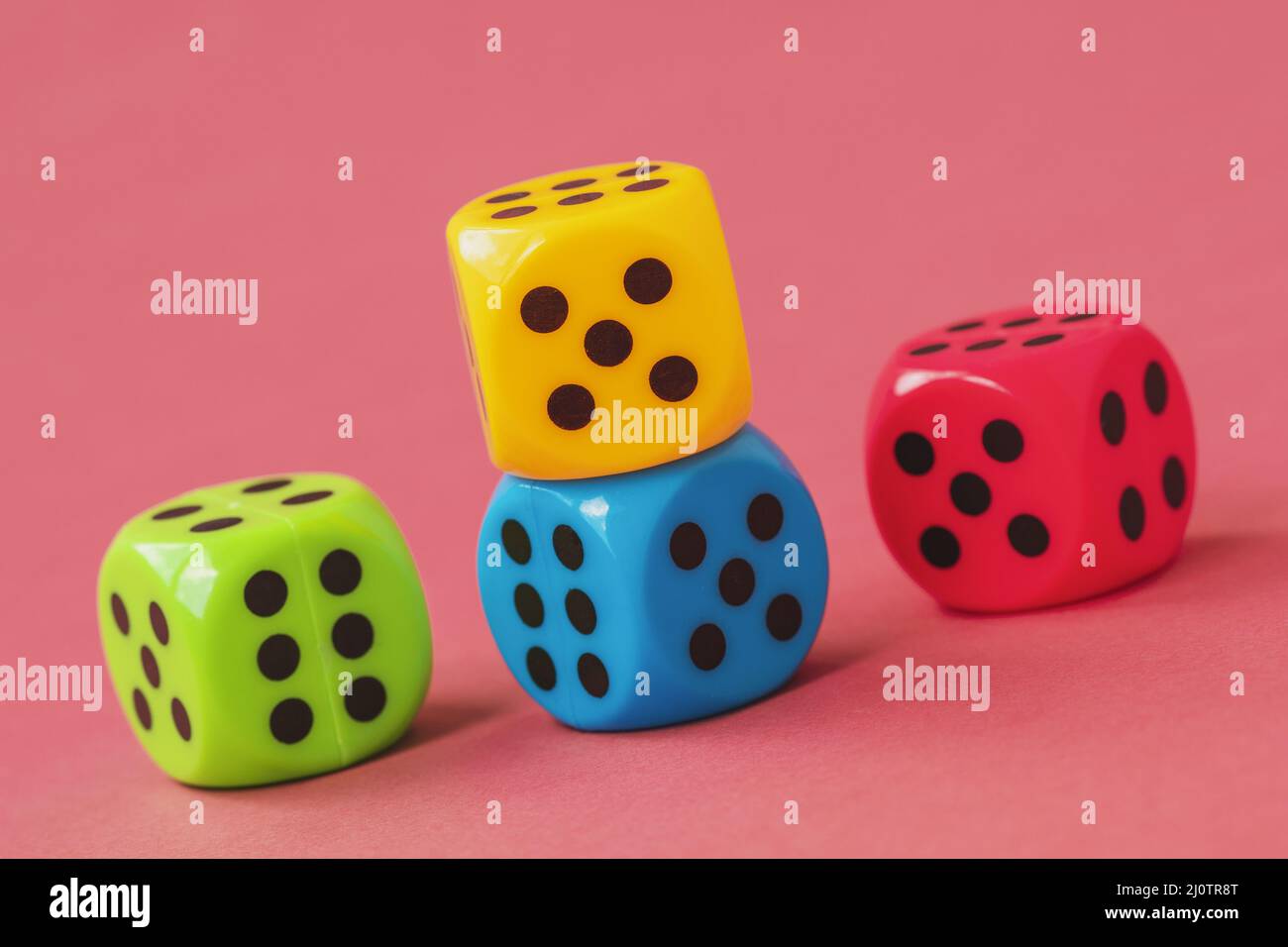 Pink dice hi-res stock photography and images - Alamy