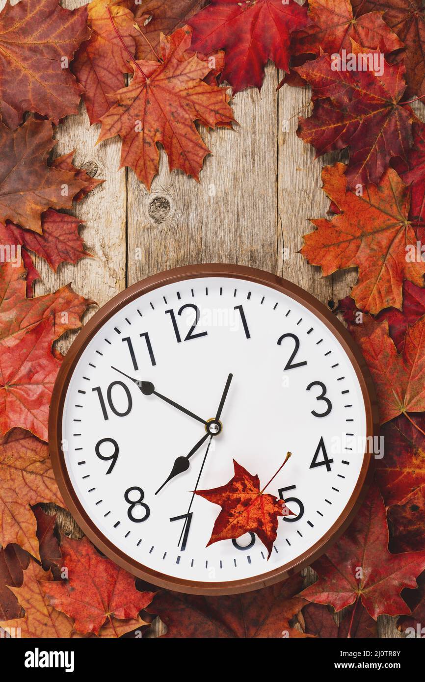 Leaves clock hi-res stock photography and images - Alamy