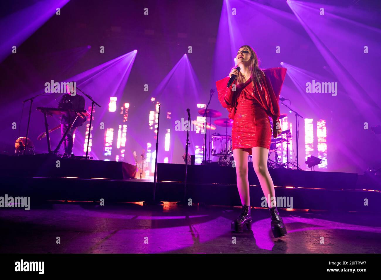 Manchester, UK. 19th March 2022. Lauren Mayberry, Iain Cook and Martin ...