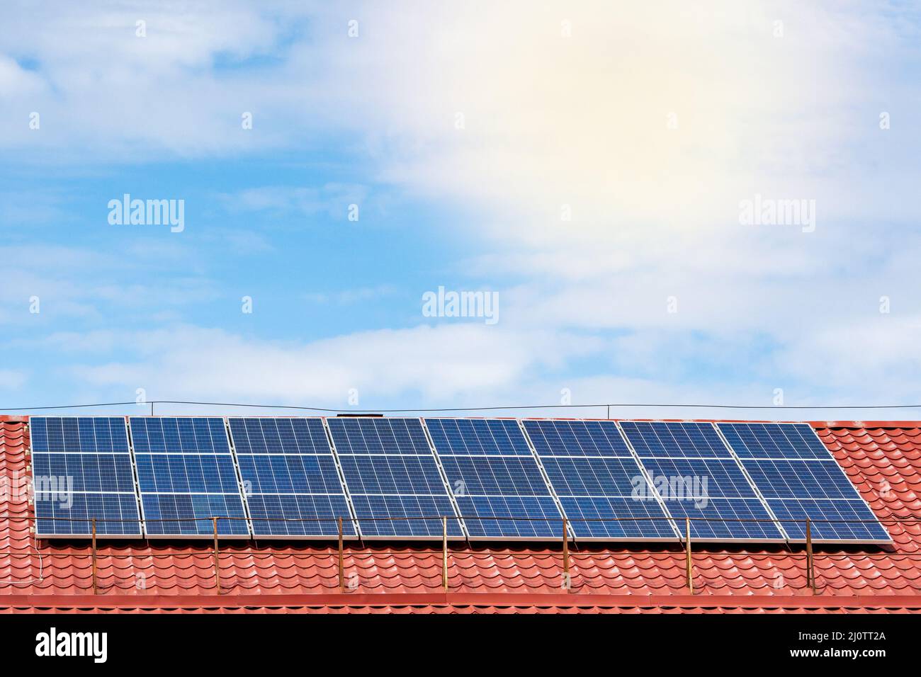 House with solar panels on top of roof Stock Photo - Alamy