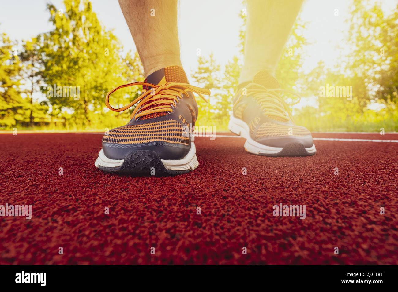 Athlete runner feet running on treadmill Stock Photo - Alamy